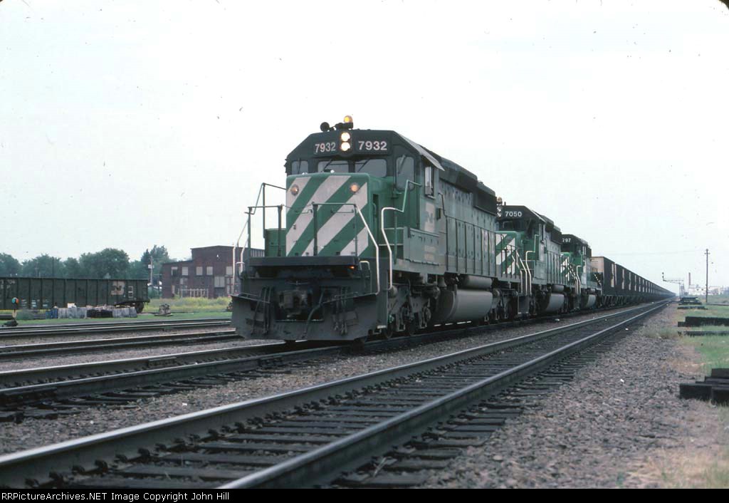 1243-09 Eastbound BN coal train passing yard